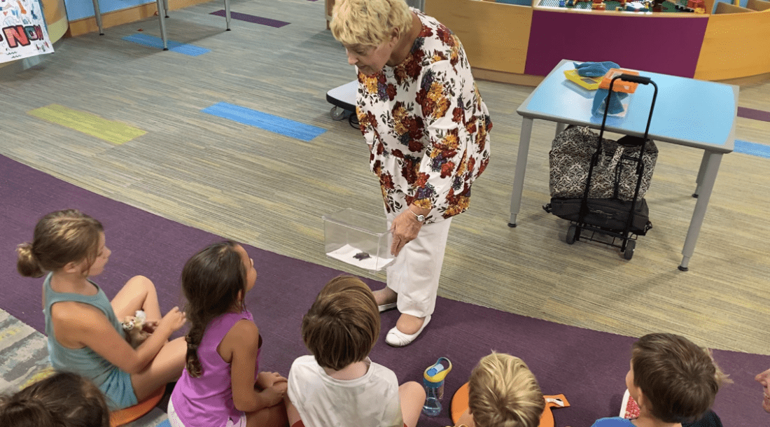 Youths read ‘all together’ during annual Summer Reading Program at ...
